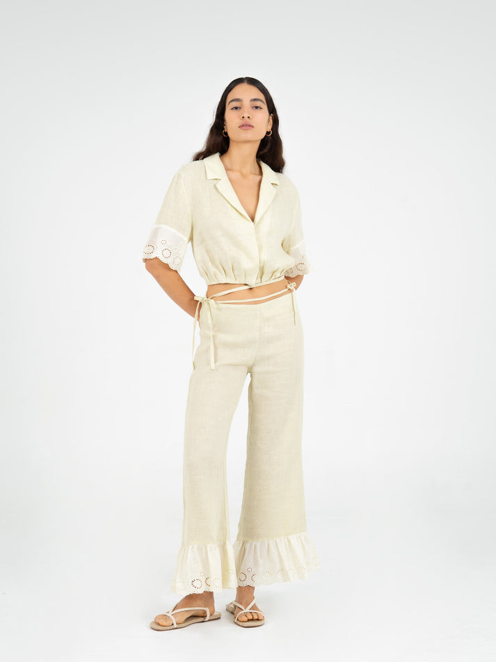 Beige linen pants with embroidered ruffles at the hem | CARMEN SAYS