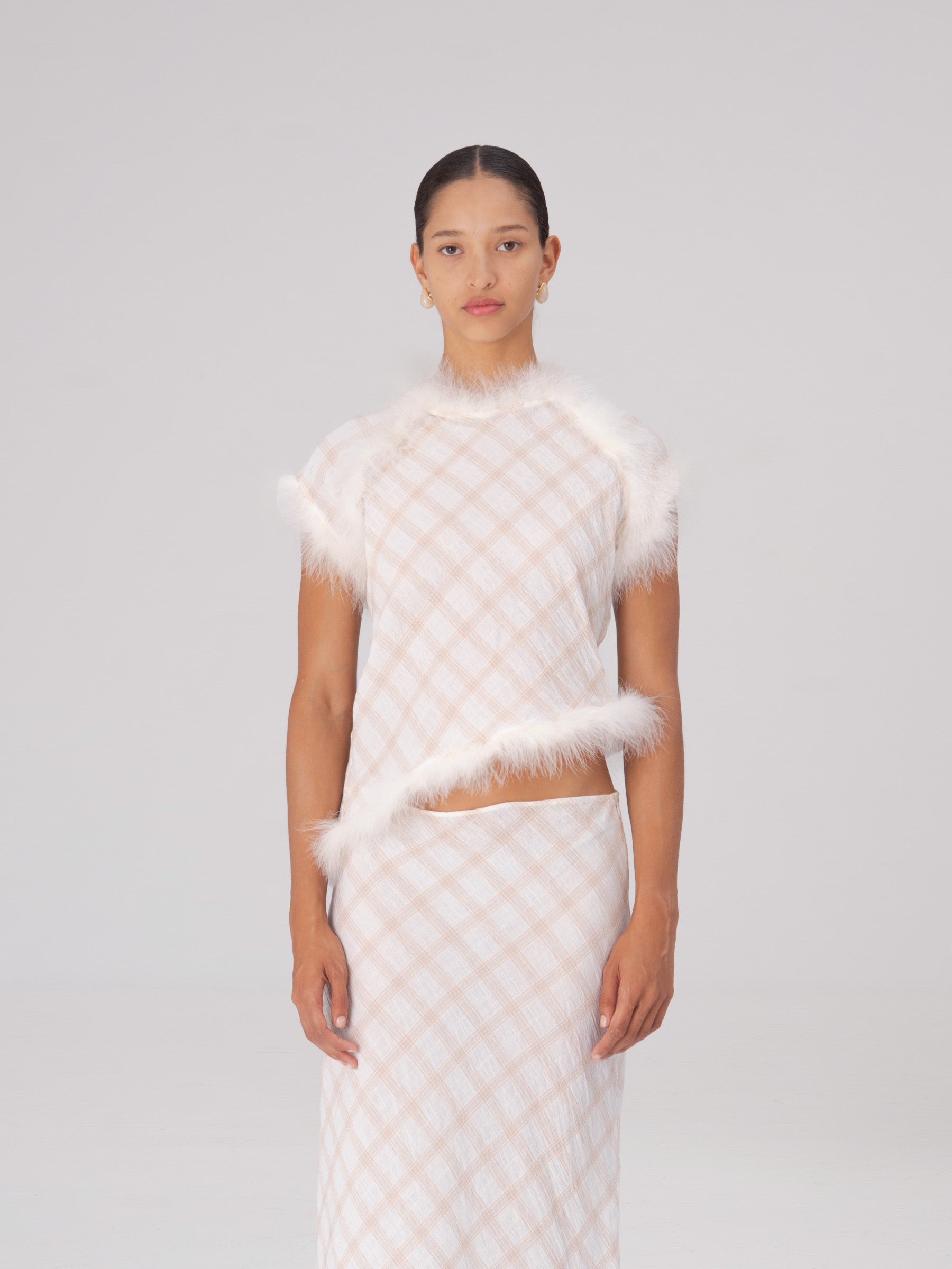 Plaid Balance Asymmetric Top with Feathers | Carmen Says